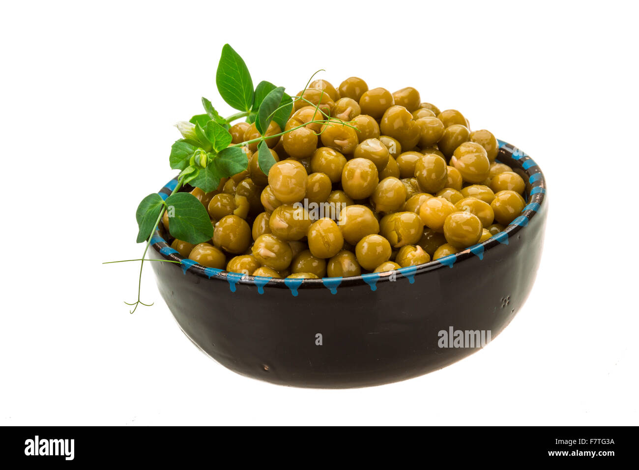 Marinated green peas with branch Stock Photo - Alamy