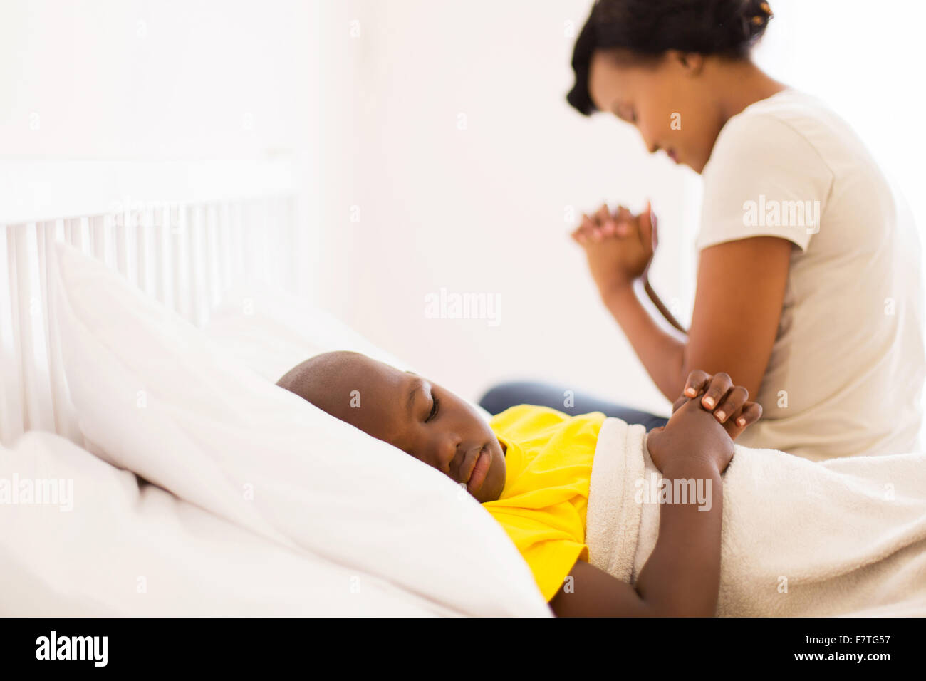 Child Praying By Bed