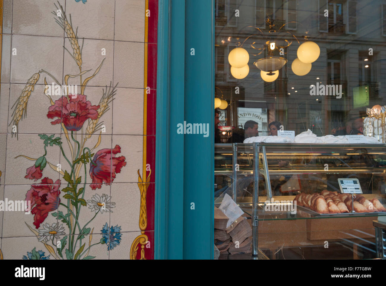 France, Paris, Looking in the window of a bakery, or boulangerie Stock ...
