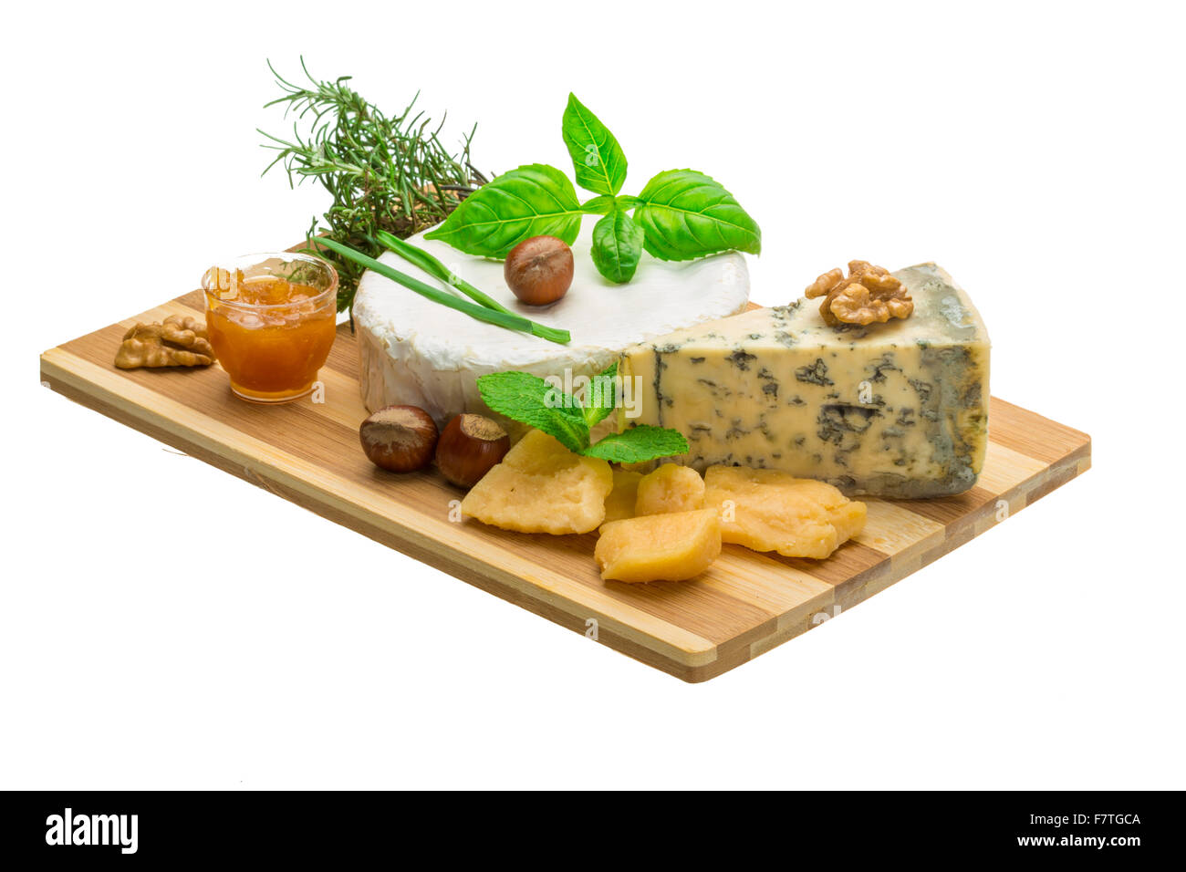 Assorted cheese - brie, dor blue and hard old yellow cheese Stock Photo ...