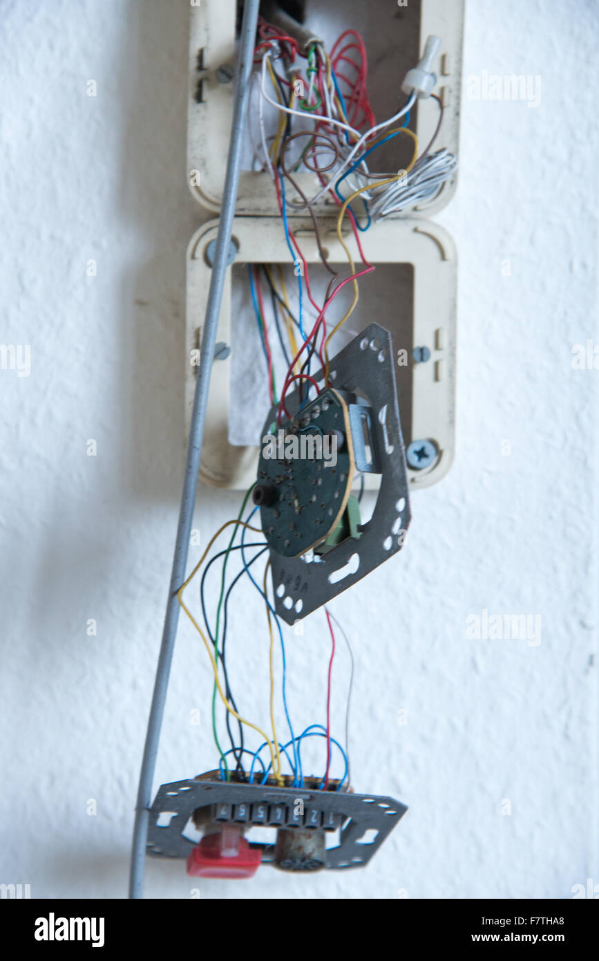 destroyed electric point at wall Stock Photo - Alamy
