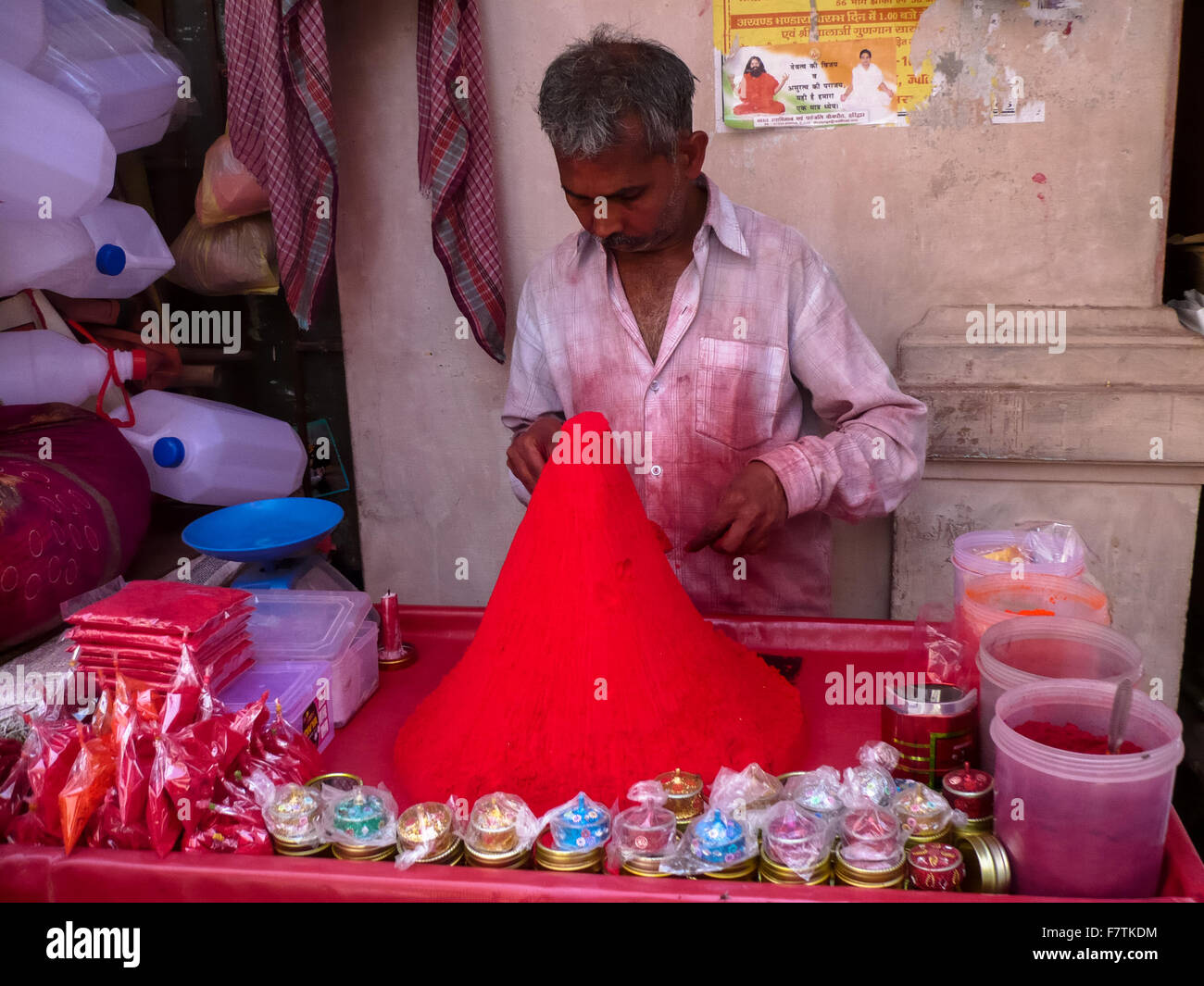 man selling red tika powder in haridwar india Stock Photo - Alamy