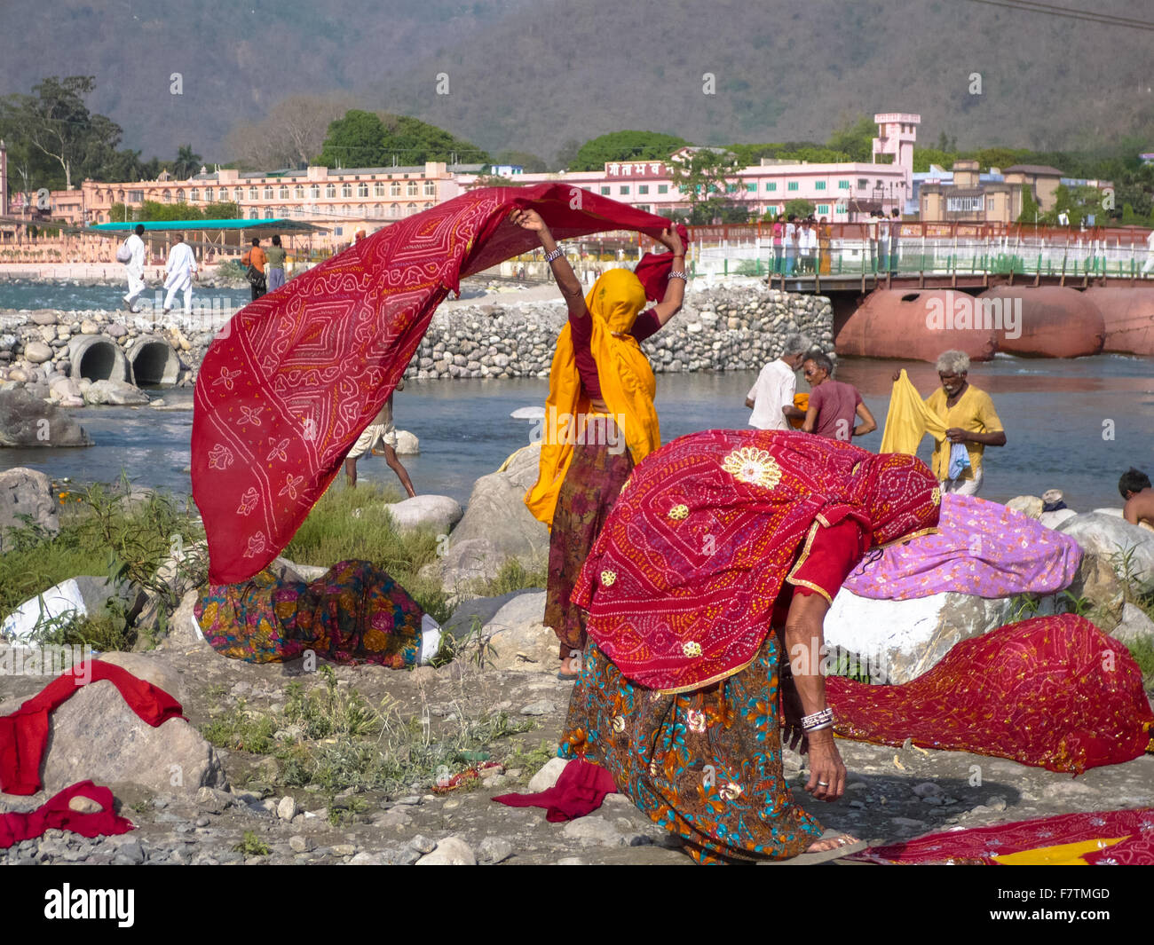 women washing clothes in holy ganges river in rishikesh Stock Photo - Alamy