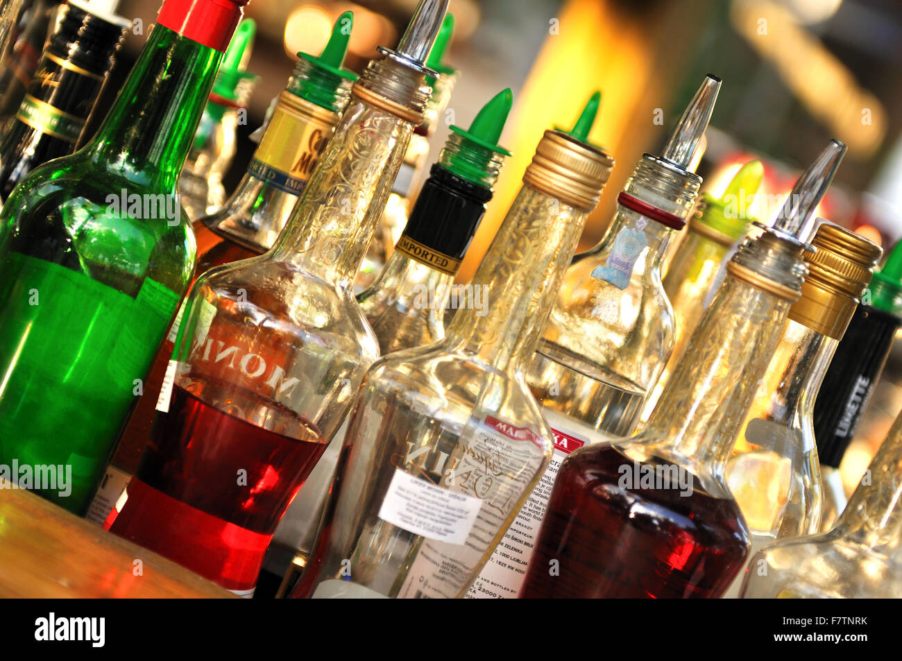 Many bottles of alcohol in a bar Stock Photo - Alamy