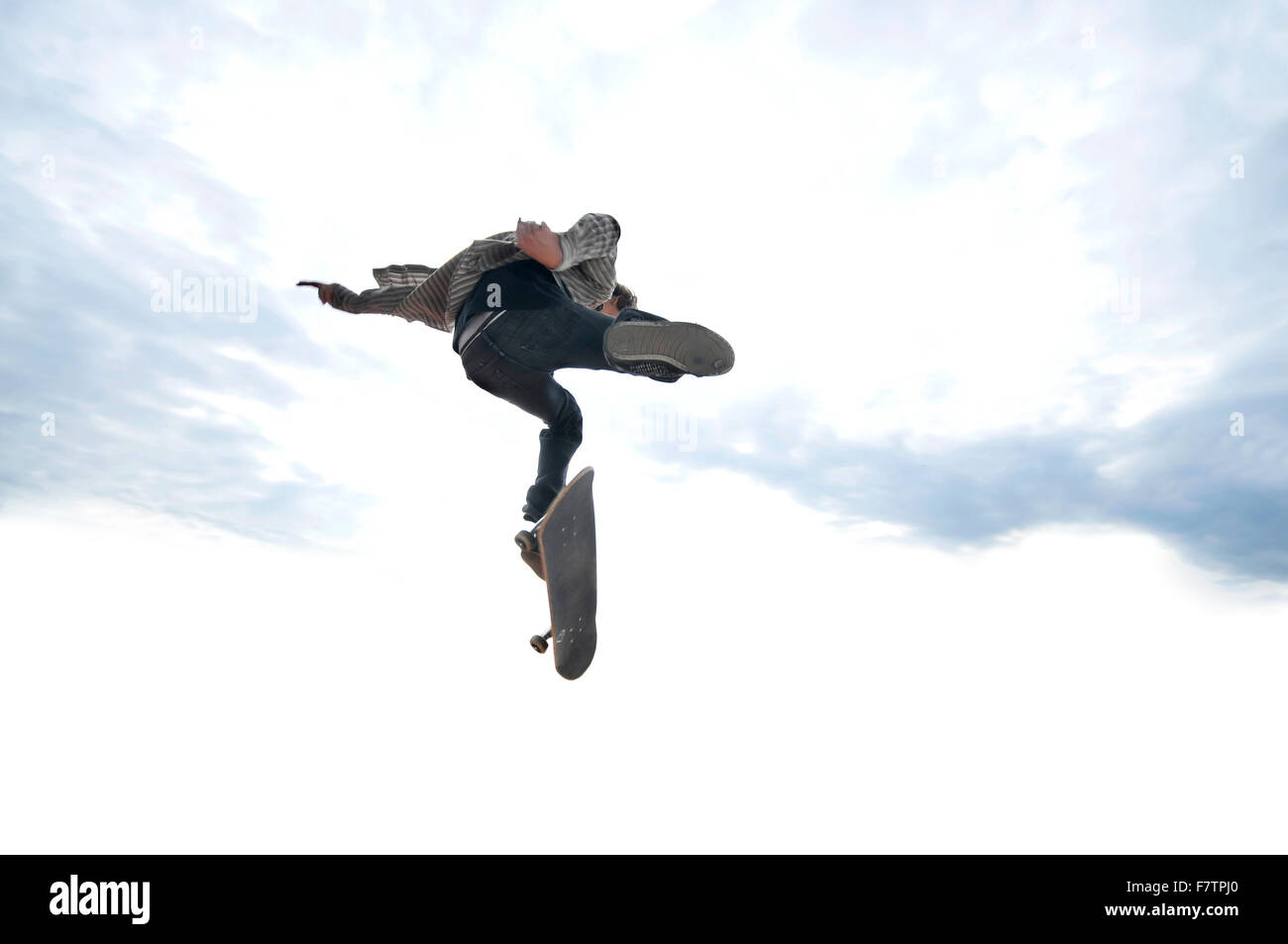 Boy practicing skate in a skate park Stock Photo - Alamy