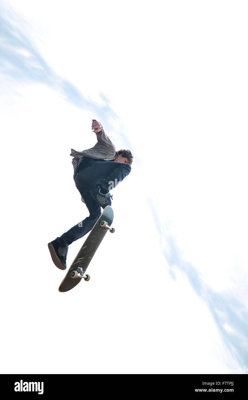 Boy practicing skate in a skate park - isolated Stock Photo - Alamy
