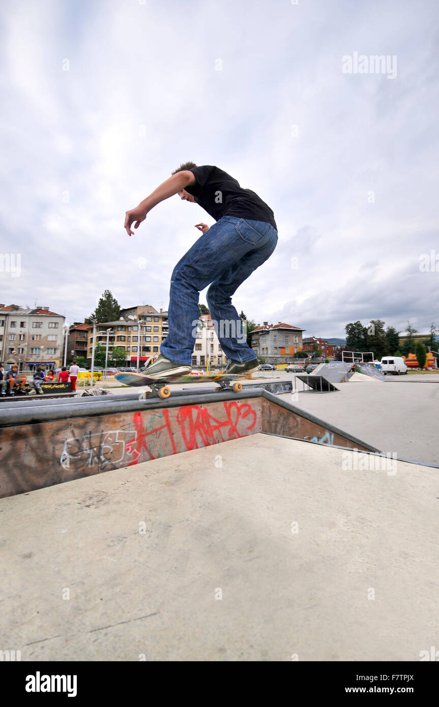 Boy practicing skate in a skate park - isolated Stock Photo - Alamy