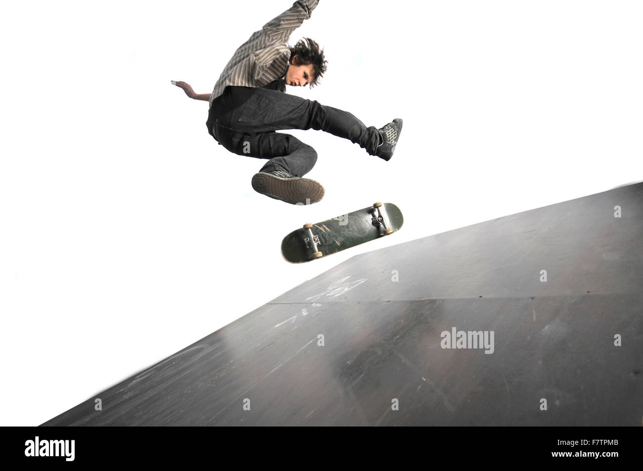 Boy practicing skate in a skate park - isolated Stock Photo - Alamy