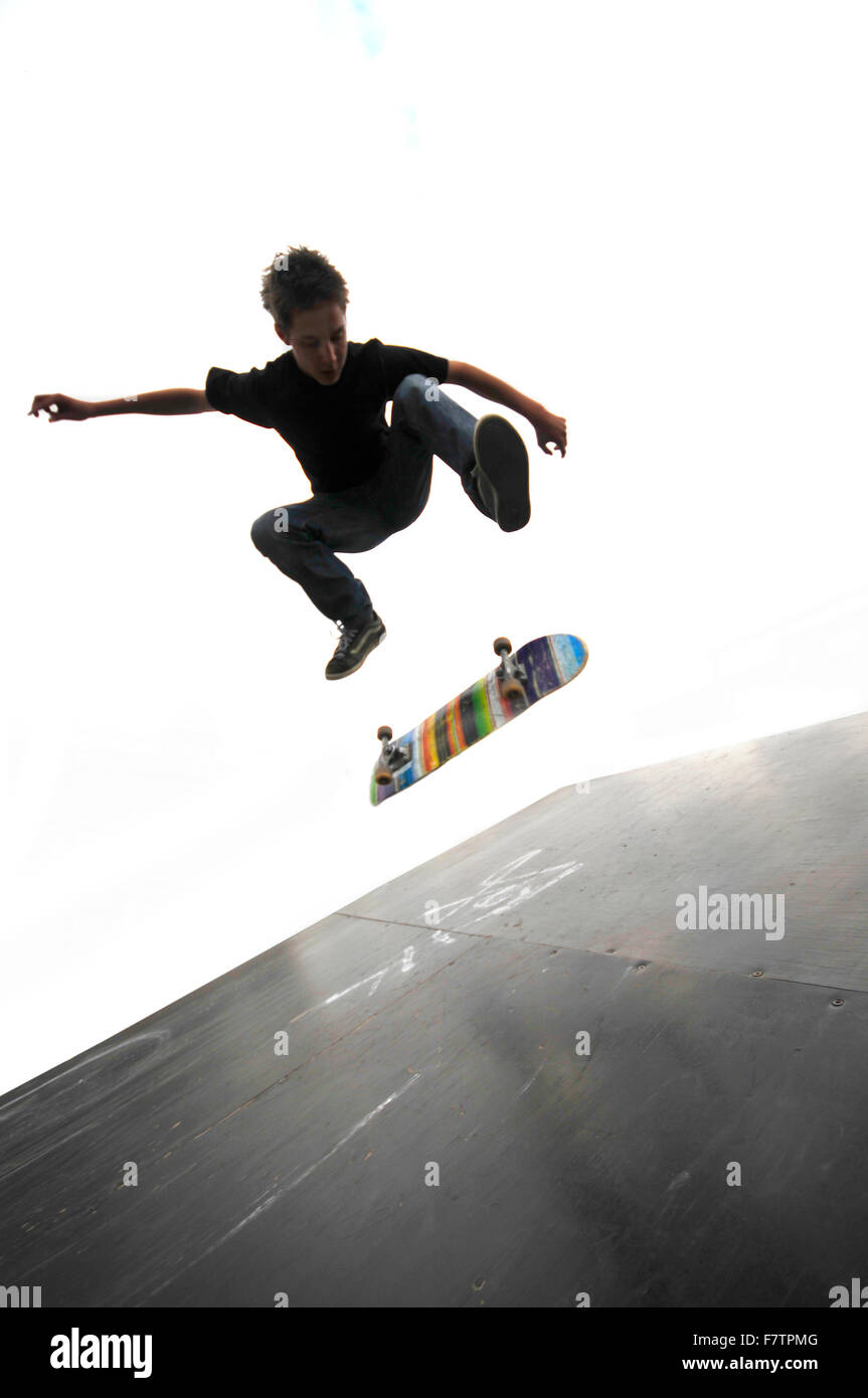 Boy practicing skate in a skate park - isolated Stock Photo - Alamy