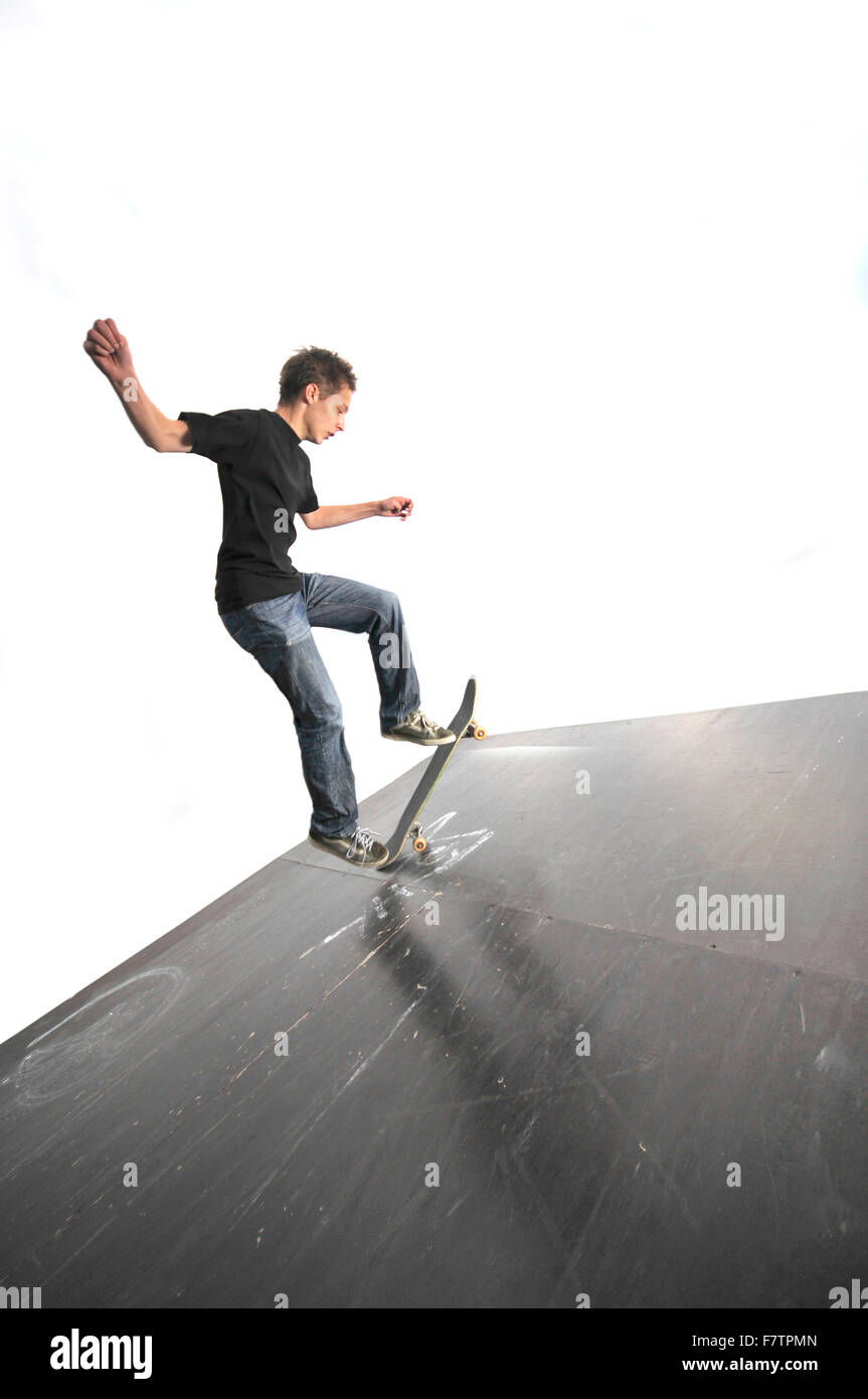 Boy practicing skate in a skate park - isolated Stock Photo - Alamy