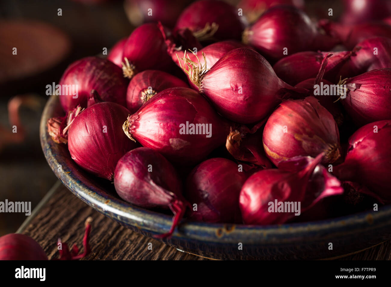 Organic Red Pearl Onions in a Bowl Stock Photo - Alamy