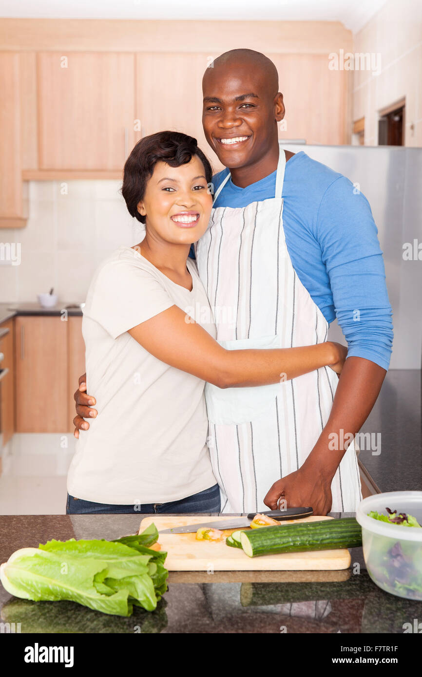 happy young black couple in kitchen Stock Photo - Alamy