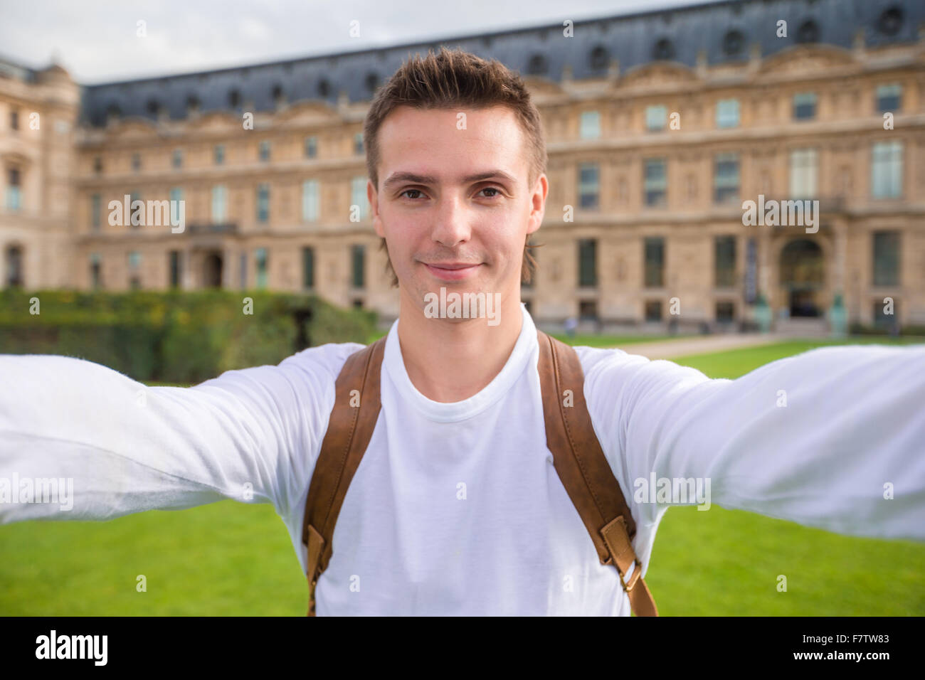 Happy young man taking a selfie photo in Paris, France Stock Photo - Alamy