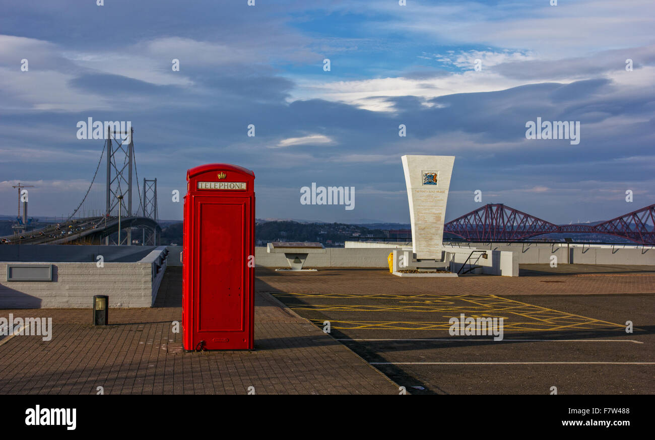 View of forth bridges with red phonebox in foreground Stock Photo - Alamy