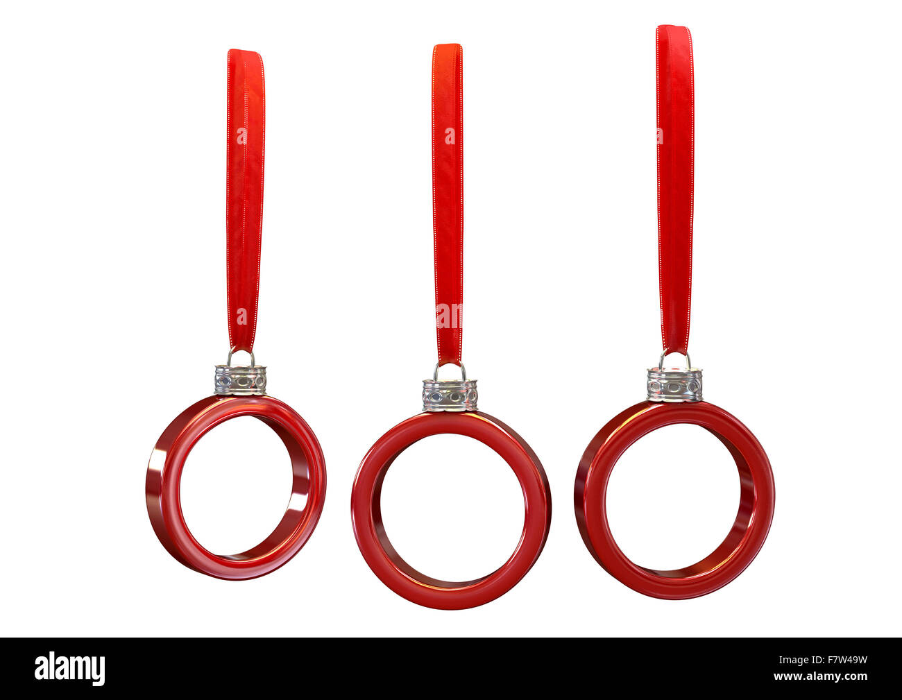 A set of three red ring shaped Christmas baubles on a isolated white ...