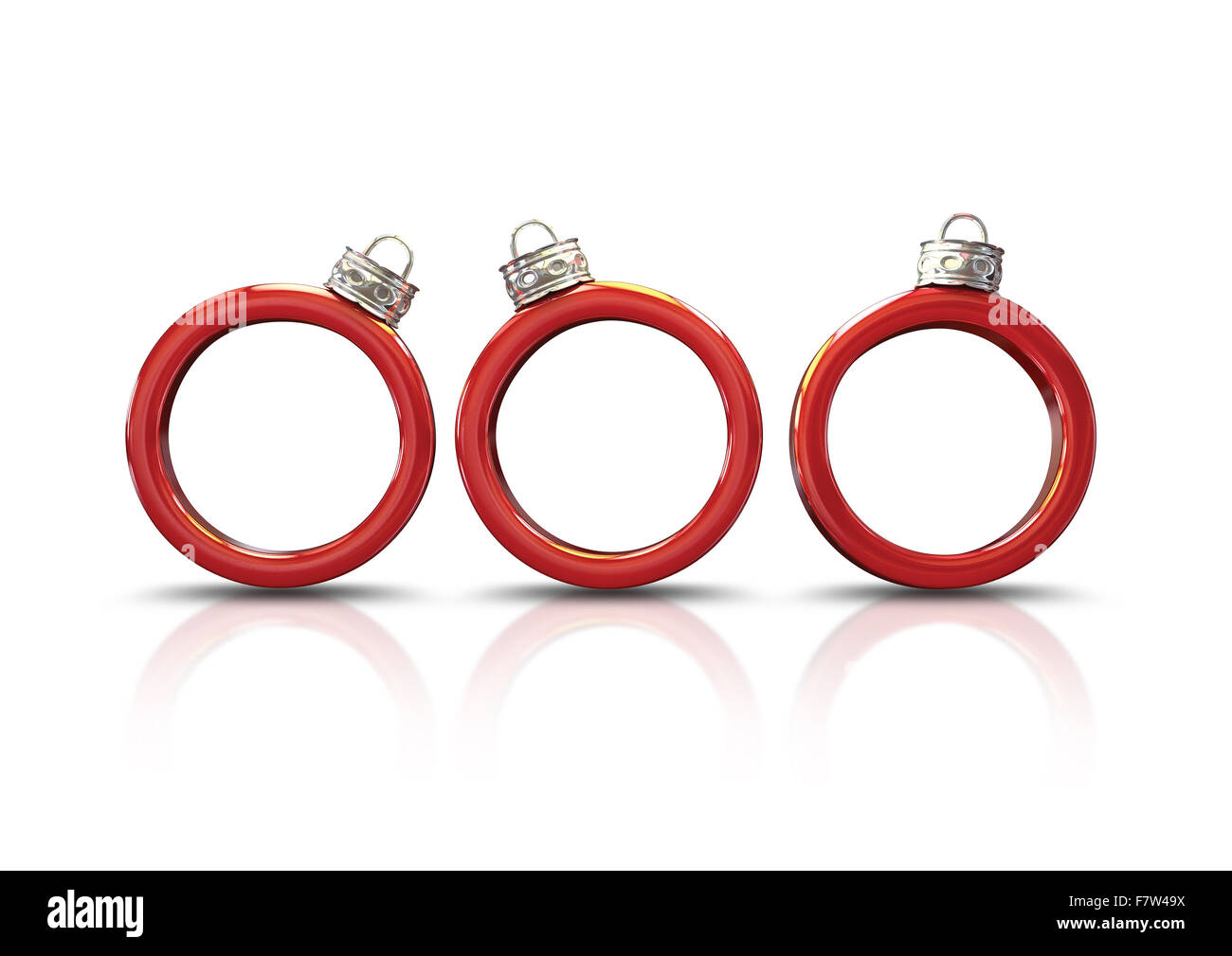 A set of three red ring shaped Christmas baubles on a isolated white ...