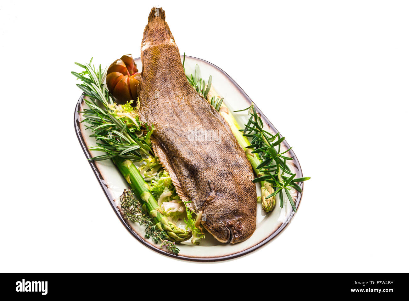 Fish Dover sole roasted Stock Photo - Alamy