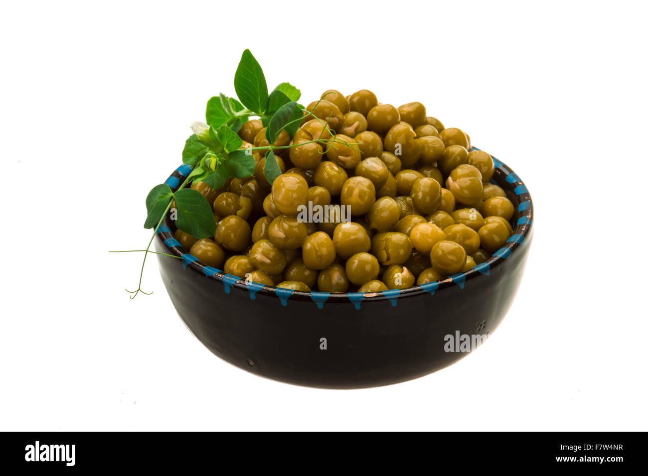 Marinated green peas with branch Stock Photo - Alamy