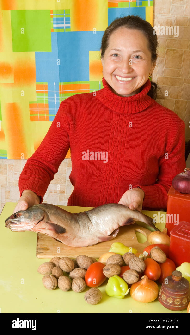 Woman salmon plate mature hi-res stock photography and images - Alamy