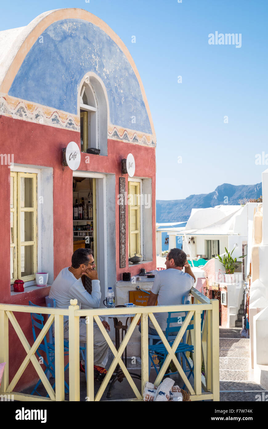 Greece, Santorini island, Oia, local people in the smallest bar of the ...