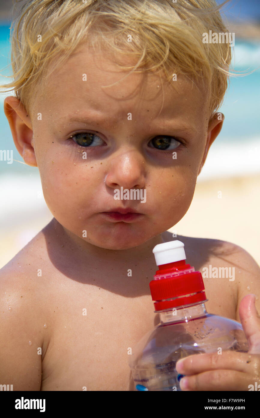 Child kid drinking water bottle hi-res stock photography and images - Alamy