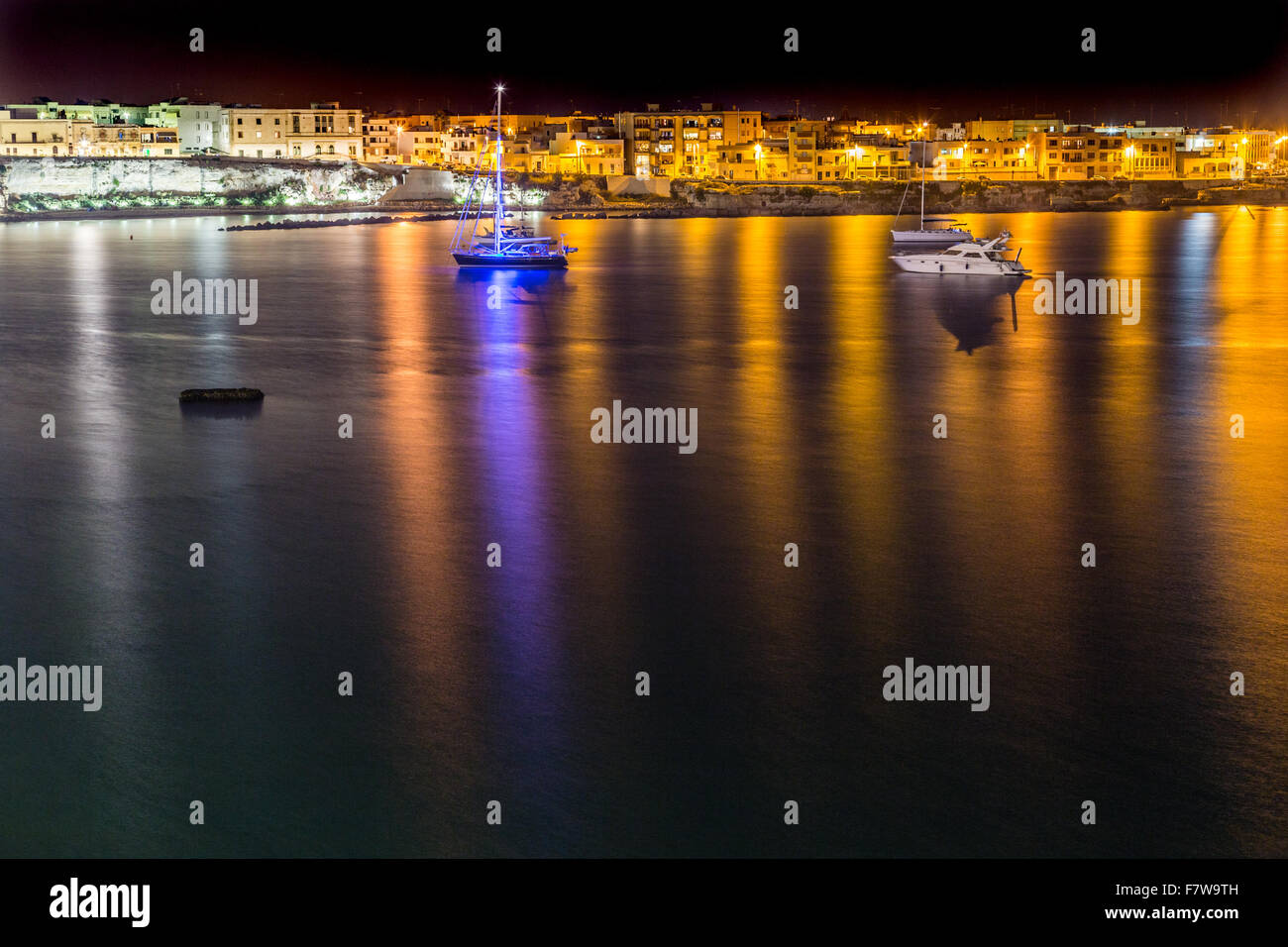 Night view of harbor of Otranto, Greek-Messapian city on the Adriatic ...