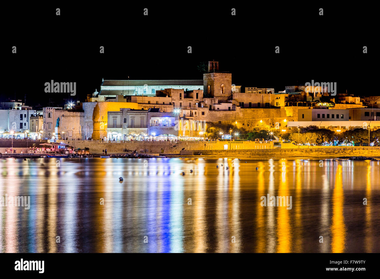 Night view of harbor of Otranto, Greek-Messapian city on the Adriatic ...