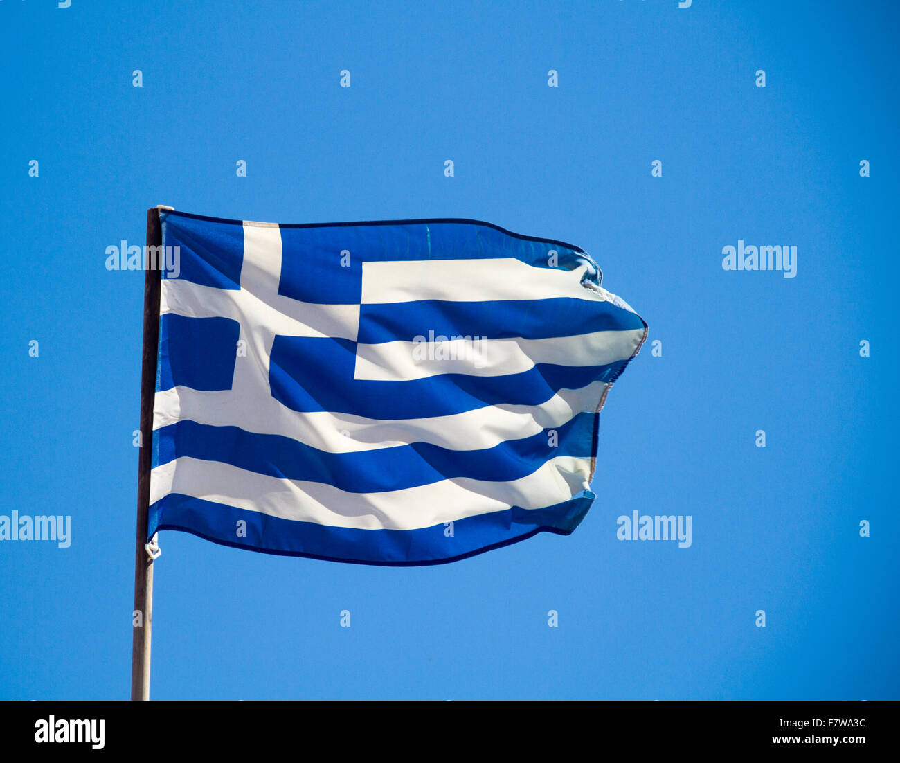 Greek flag in a blue sky Stock Photo - Alamy