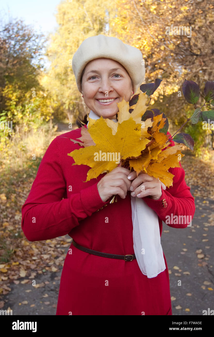 Elegant lady in fall park hi-res stock photography and images - Alamy