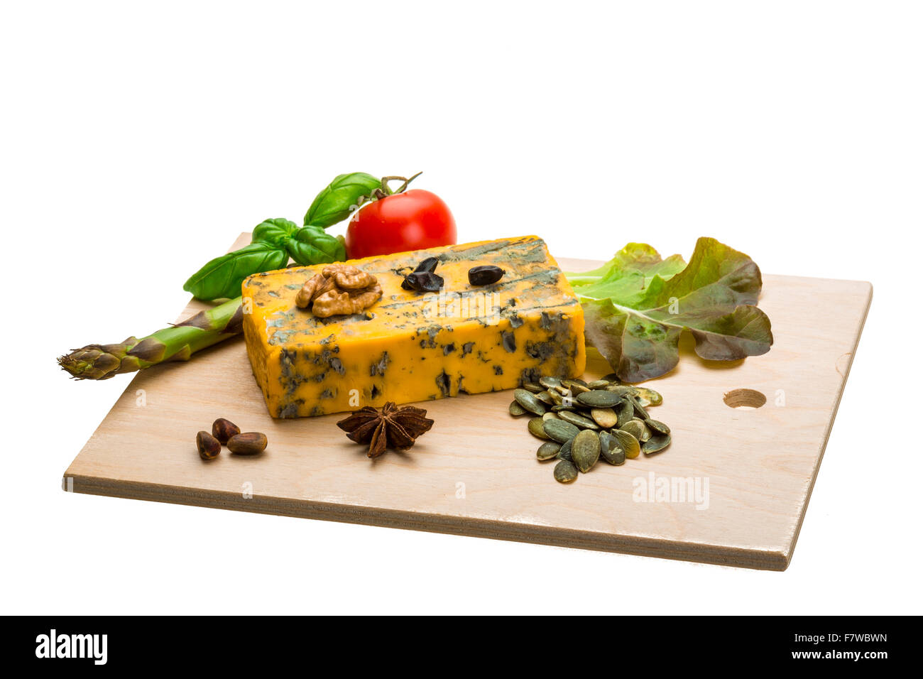 Gold cheese with mould Stock Photo - Alamy