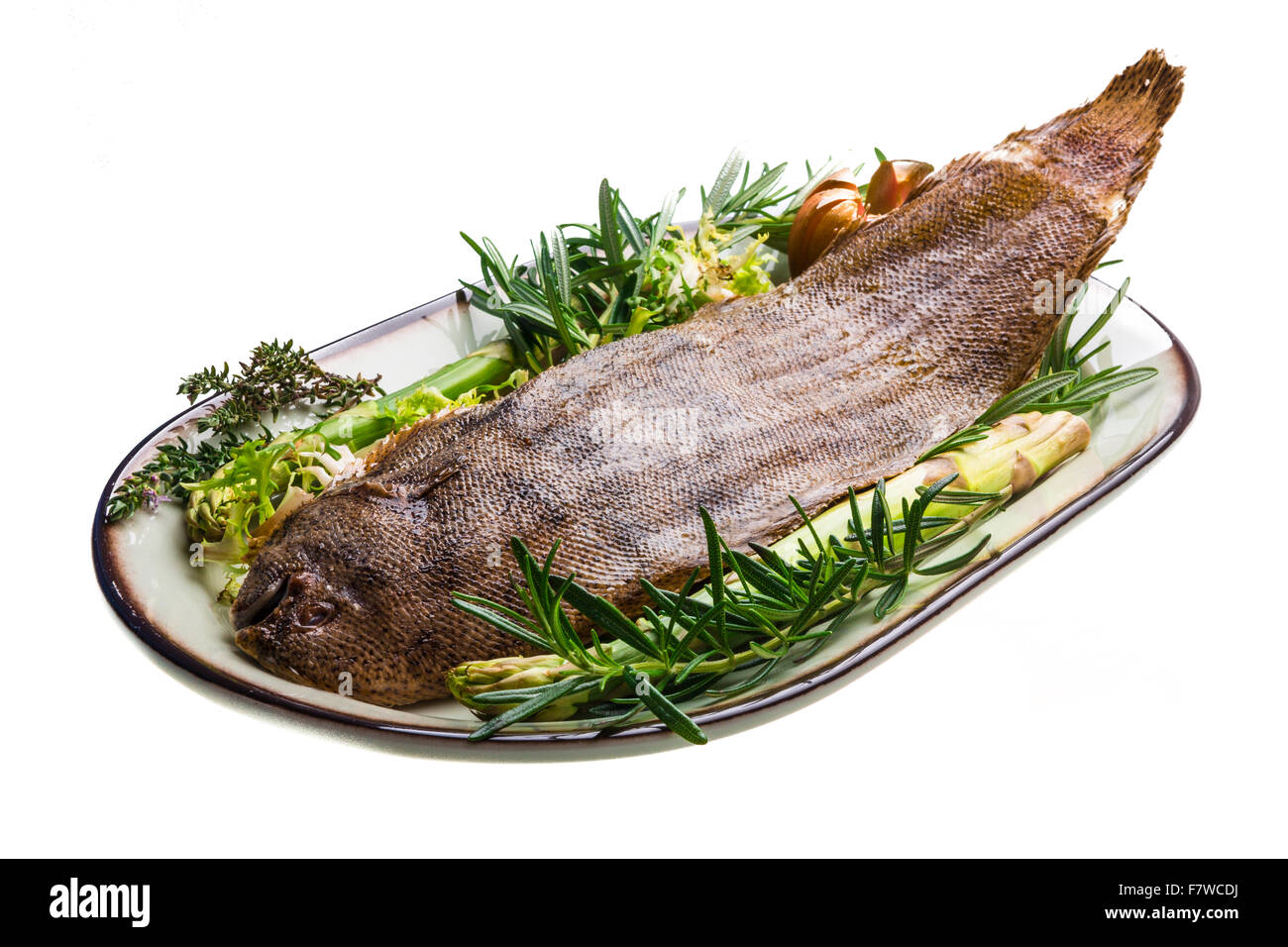 Fish Dover sole roasted Stock Photo - Alamy