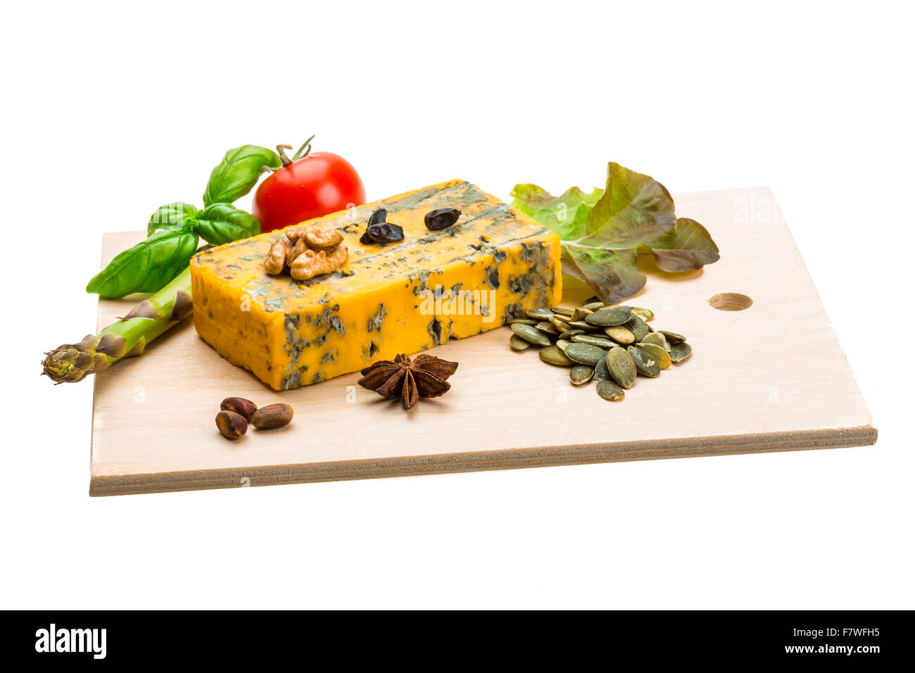 Gold cheese with mould Stock Photo - Alamy