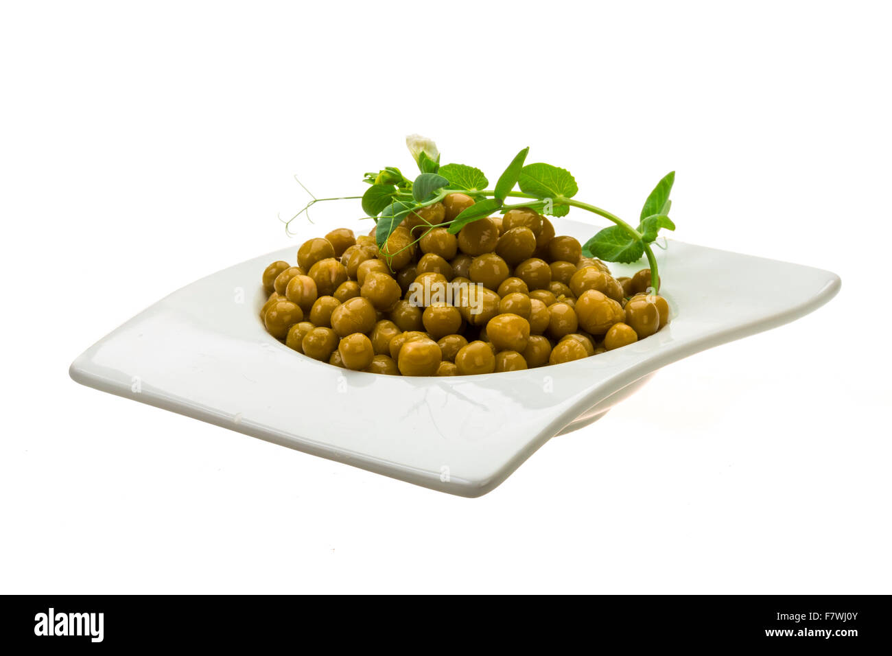Marinated green peas with branch Stock Photo - Alamy