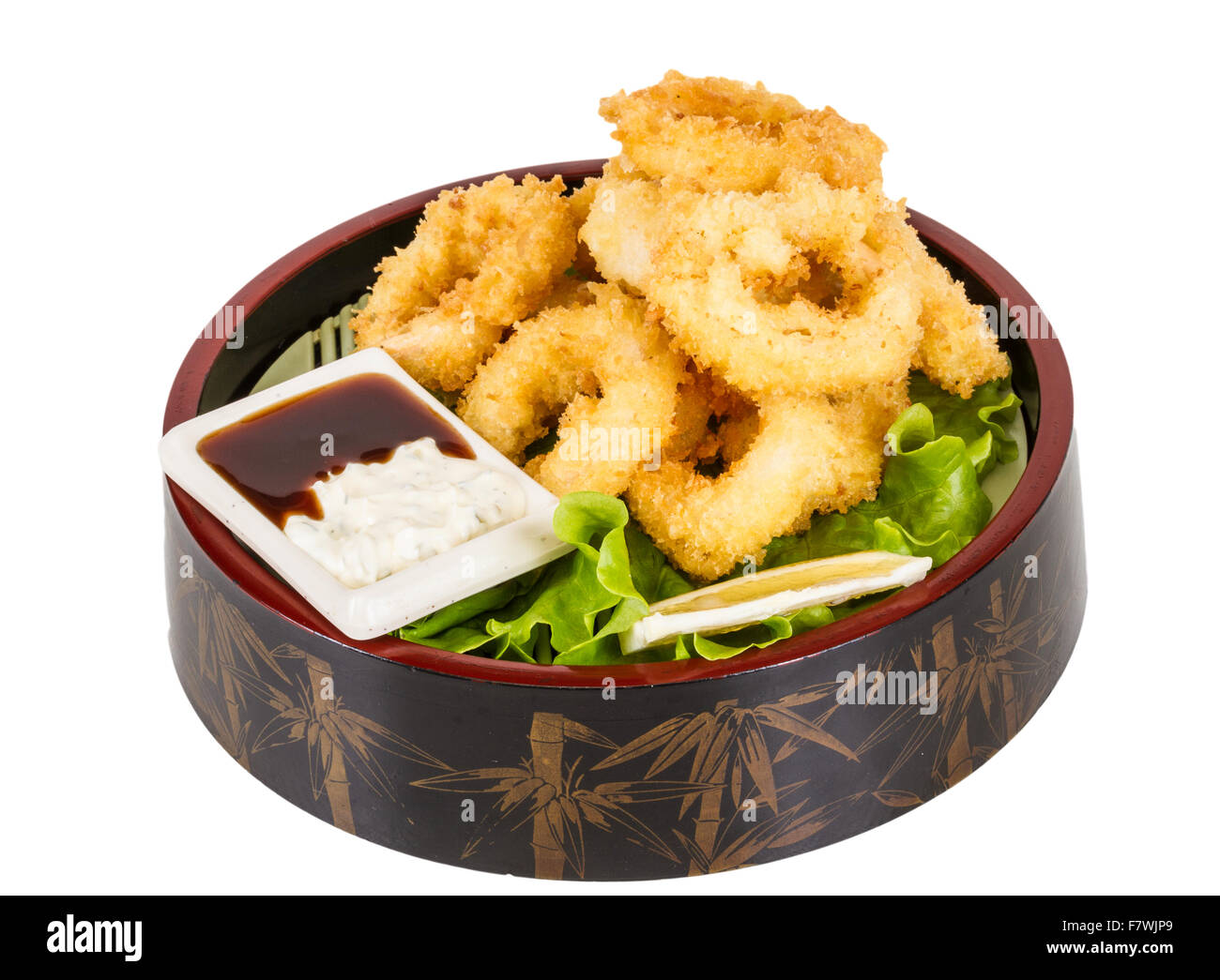 Deep batter fried squid rings calamari with green salad Stock Photo - Alamy