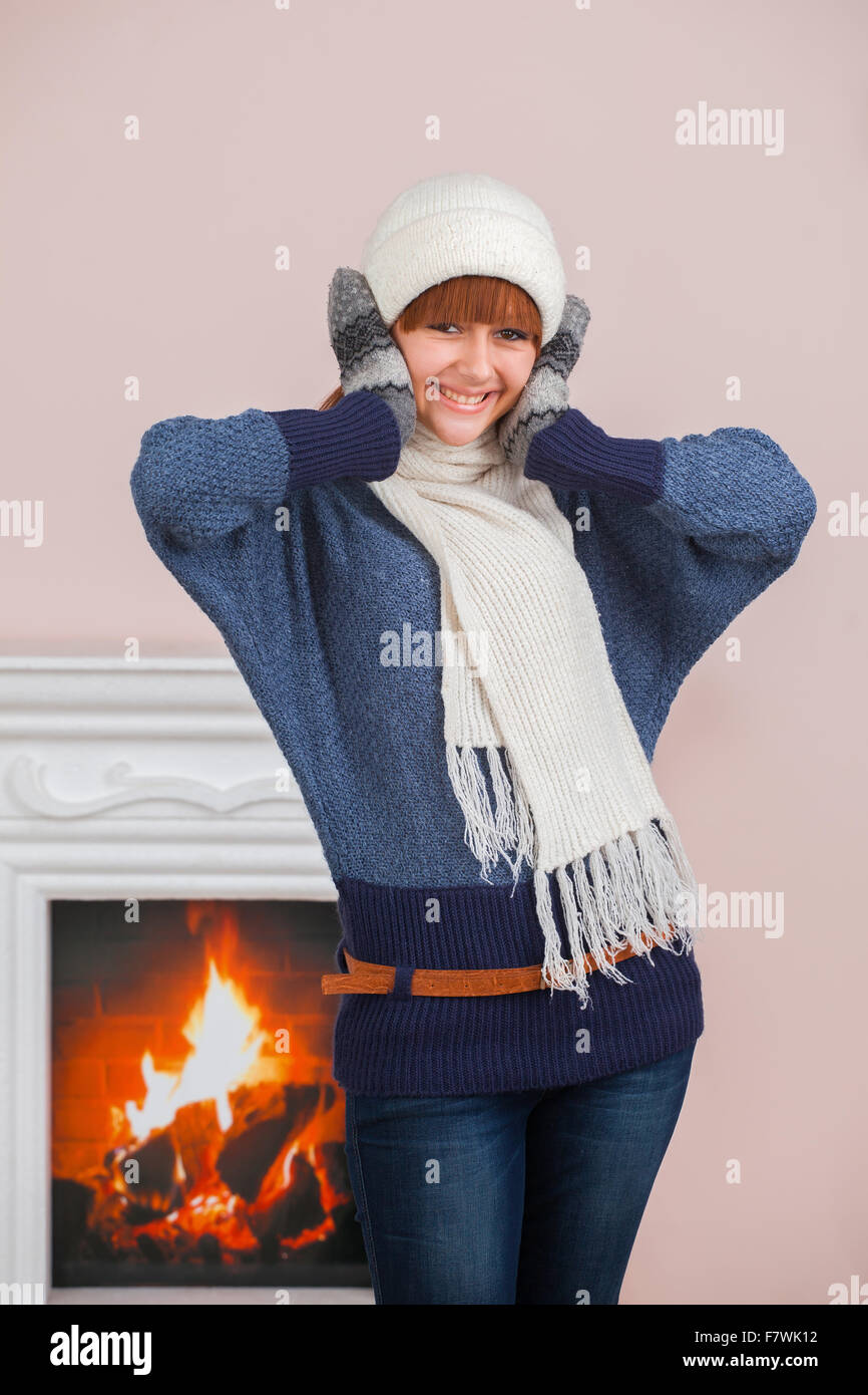 Girl near fireplace Stock Photo - Alamy