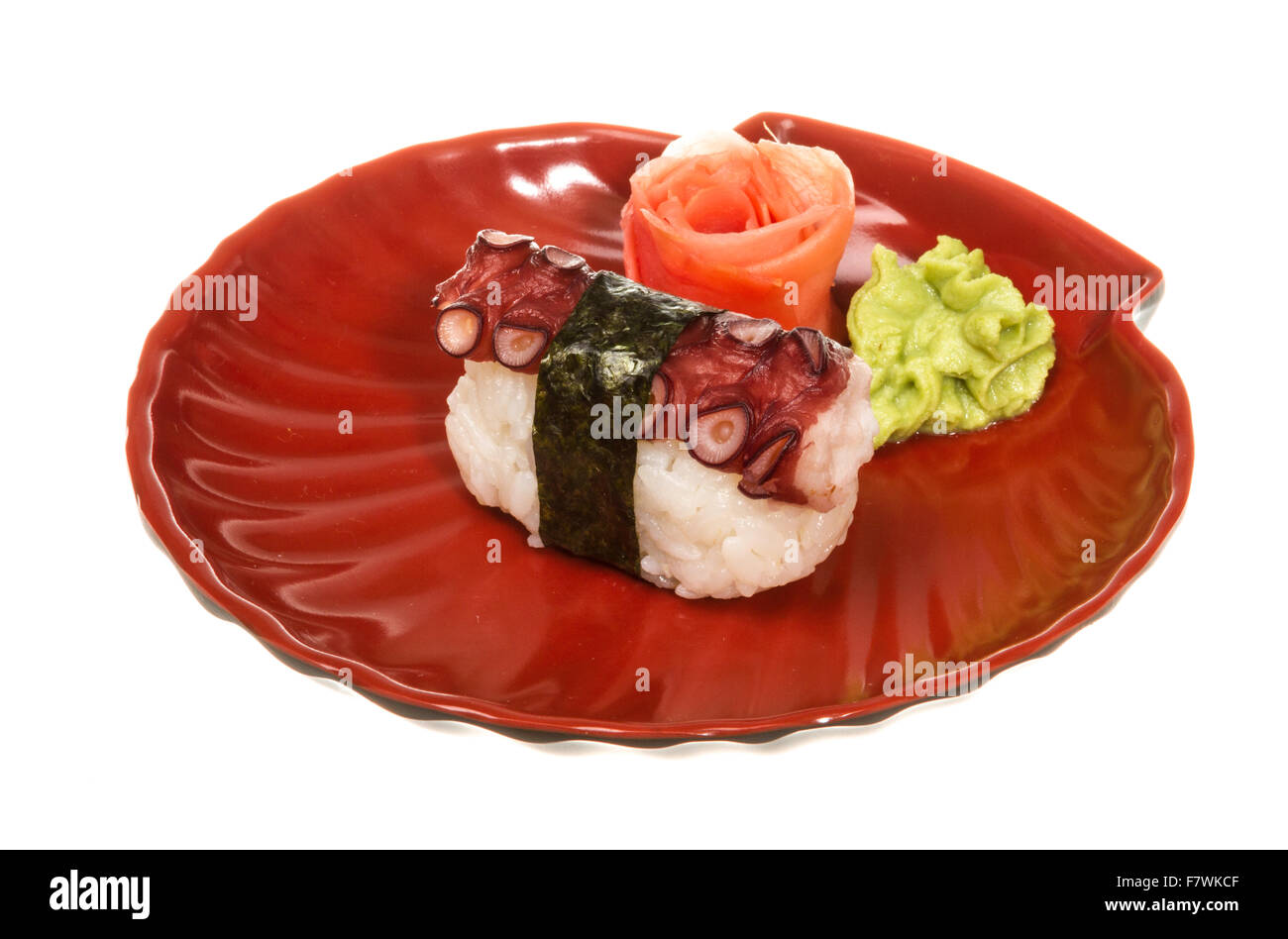 Japanese sushi with meat octopus on a white background Stock Photo - Alamy