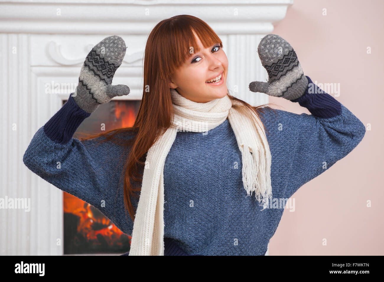 Girl near fireplace Stock Photo - Alamy