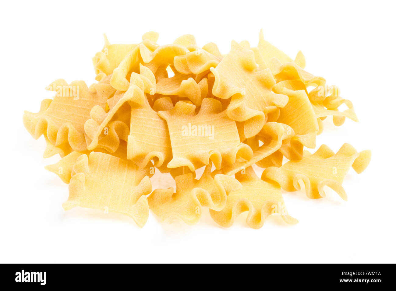 Raw yellow Italian pasta Stock Photo - Alamy