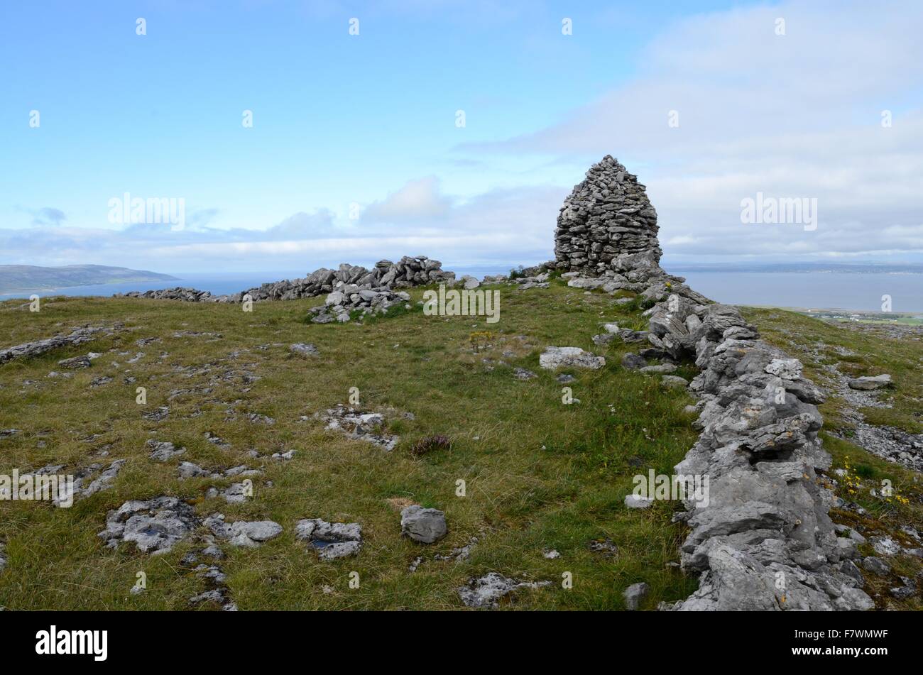 conical stone cairn at the summit of Abbey Hill the Burren County Clare ...