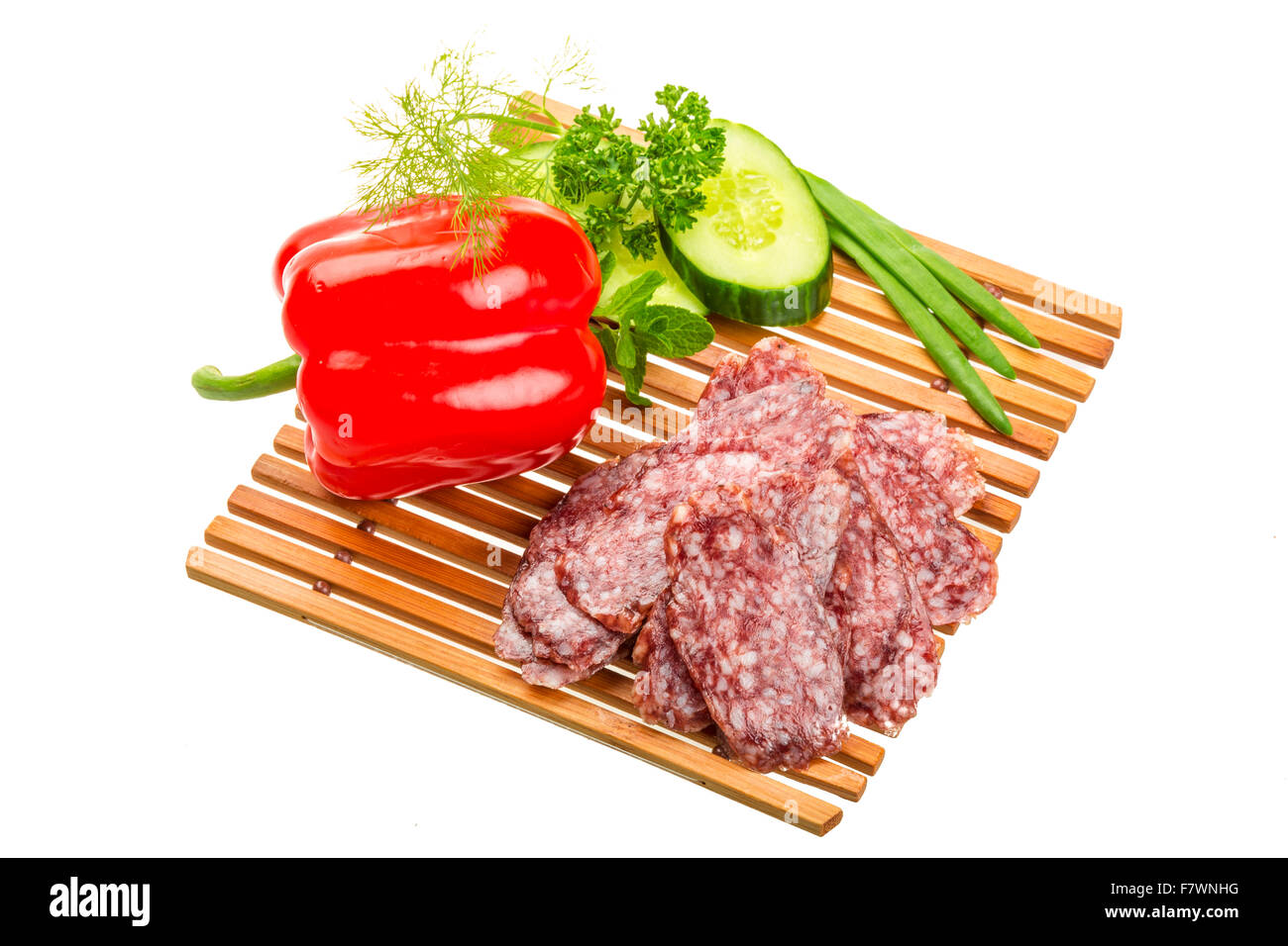 Fresh ripe salami with vegetables Stock Photo - Alamy
