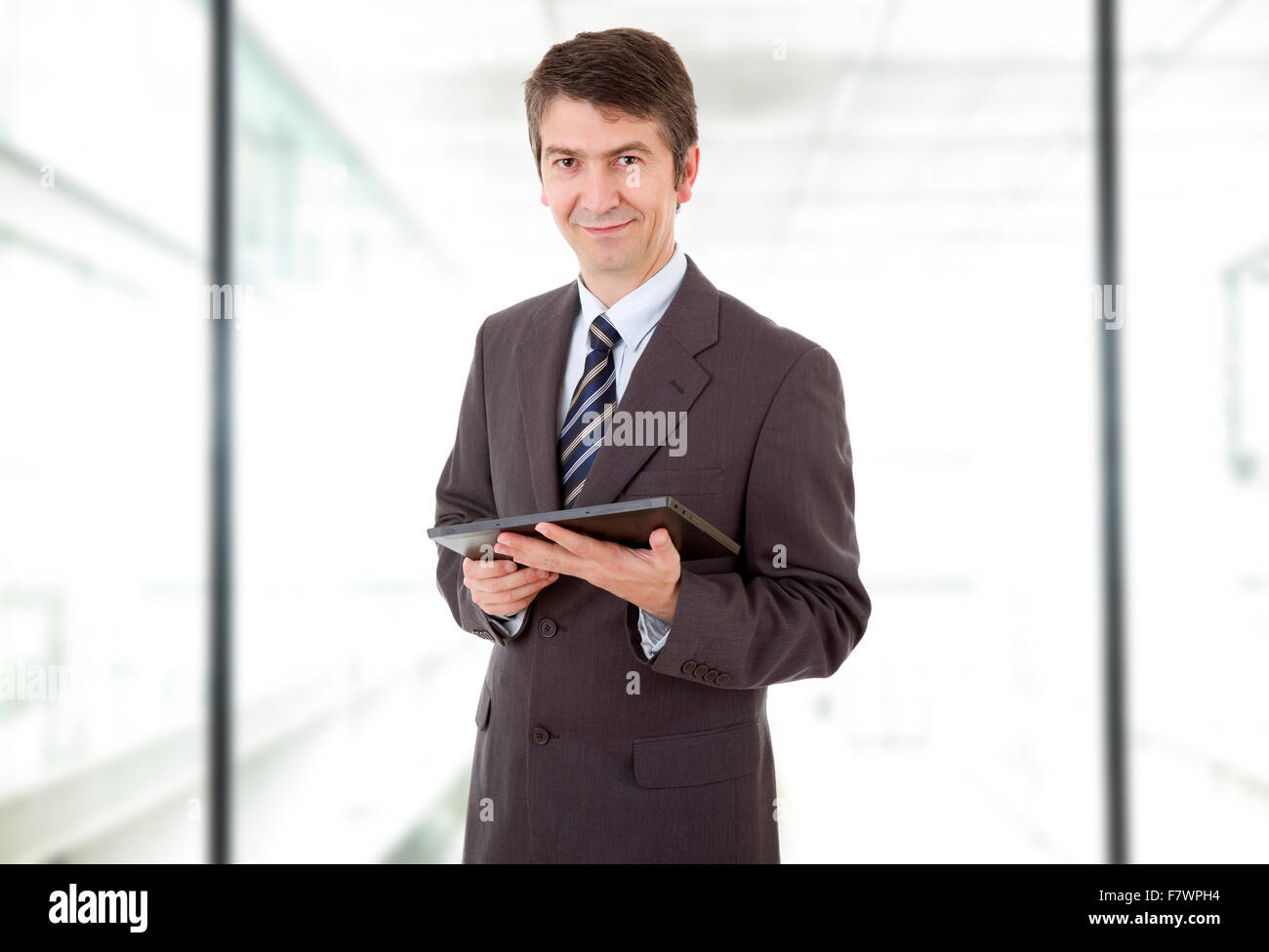 businessman using touch pad of tablet pc, at the office Stock Photo - Alamy