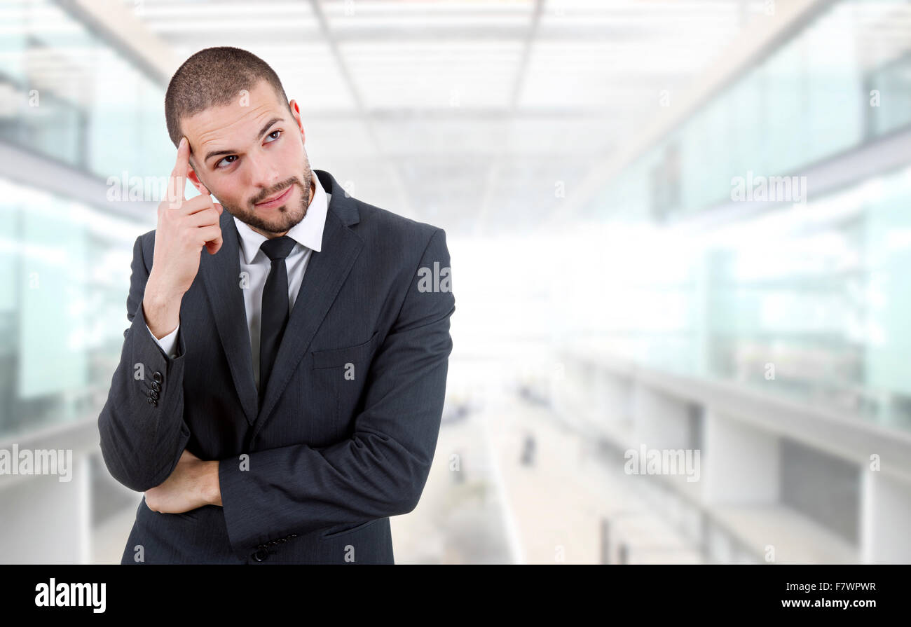 young business man thinking at the office Stock Photo - Alamy