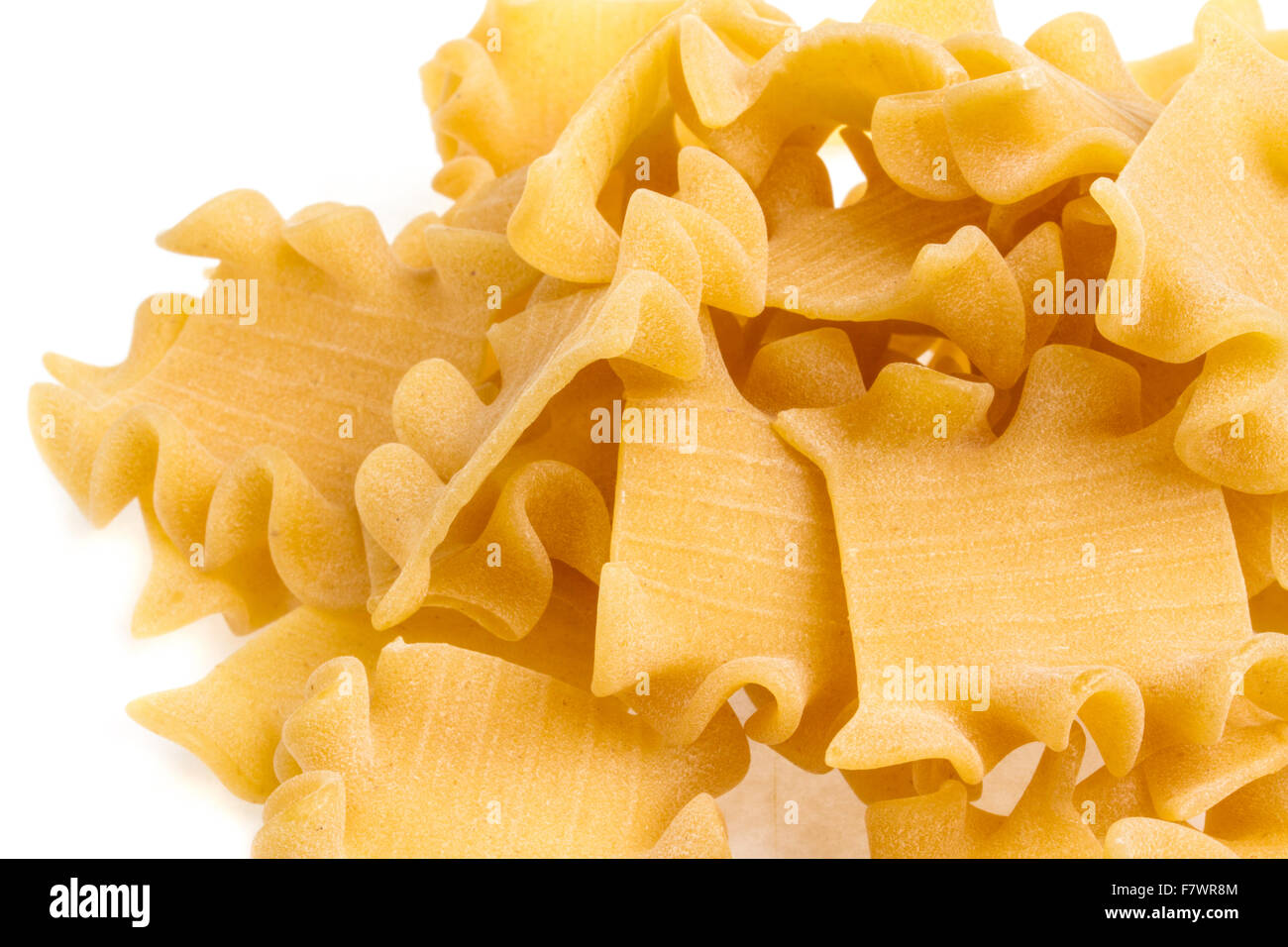 Raw yellow Italian pasta Stock Photo - Alamy