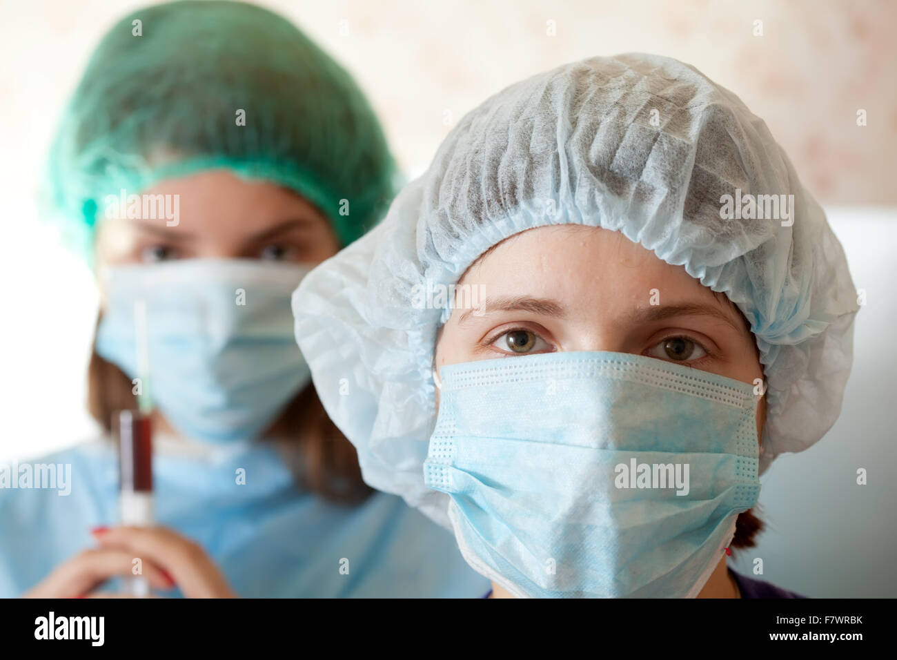 two young doctors in mask at clinic Stock Photo - Alamy