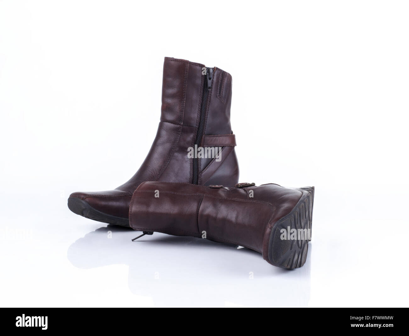 pair of leather boots on white background Stock Photo - Alamy