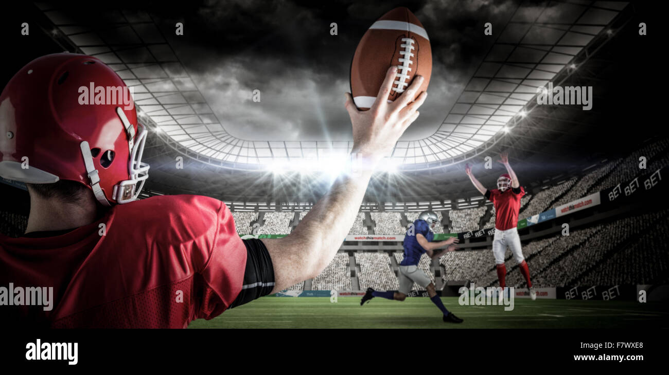 Composite image of american football players Stock Photo - Alamy