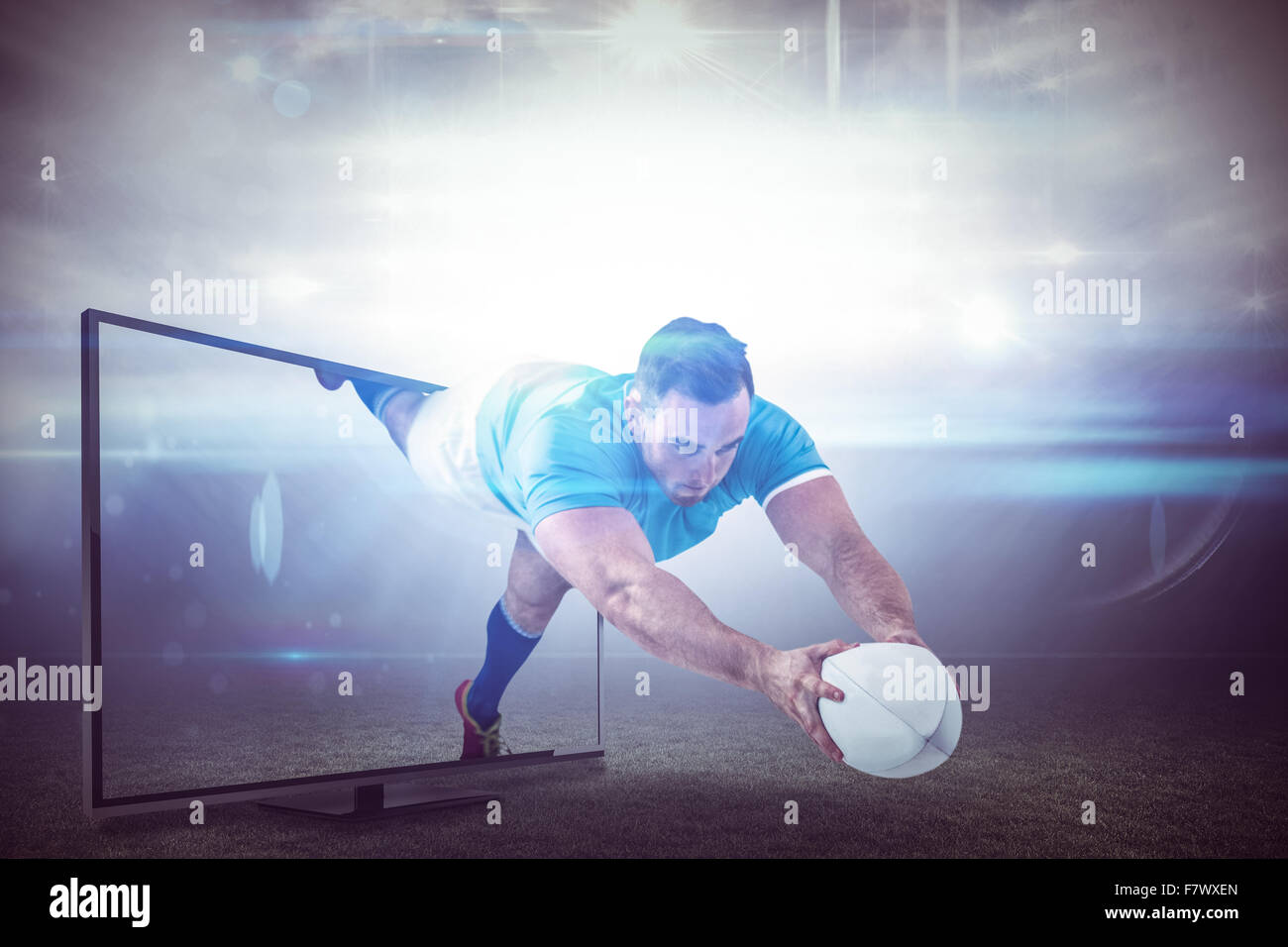 Composite image of rugby player scoring a try Stock Photo - Alamy