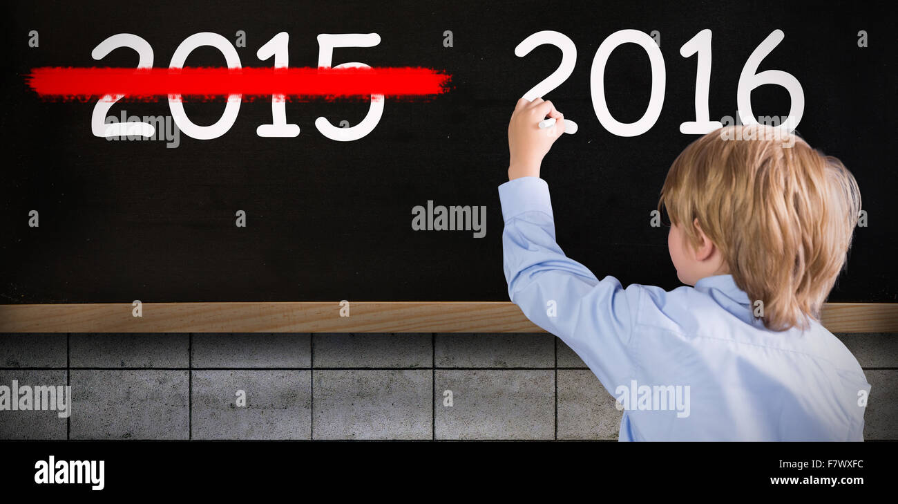 Composite image of cute pupil writing Stock Photo - Alamy