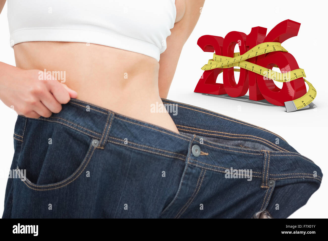 Woman holding waist of pants hi-res stock photography and images - Alamy