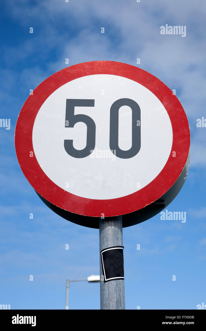 Fifty Traffic Speed Limit Sign on Blue Sky Background Stock Photo - Alamy